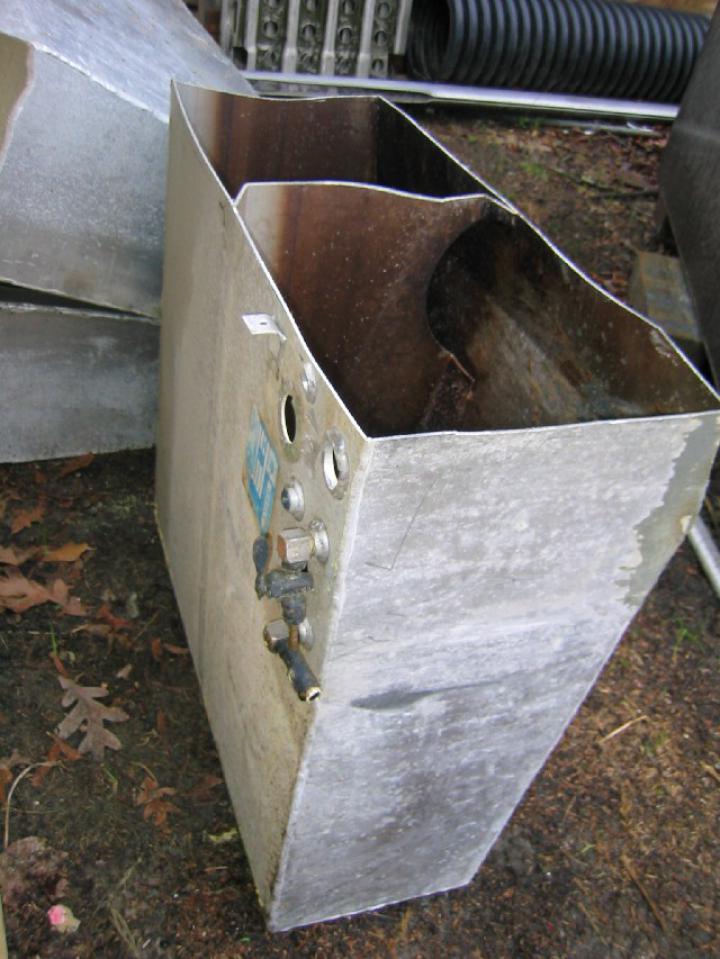 Fuel Tank Replacement - Old Fuel tank, cut open.